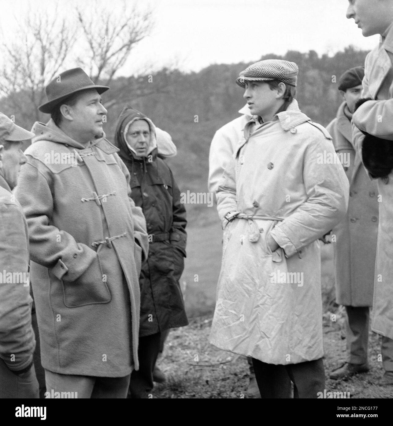 Italian movie director Roberto Rossellini, left, talks with his son ...