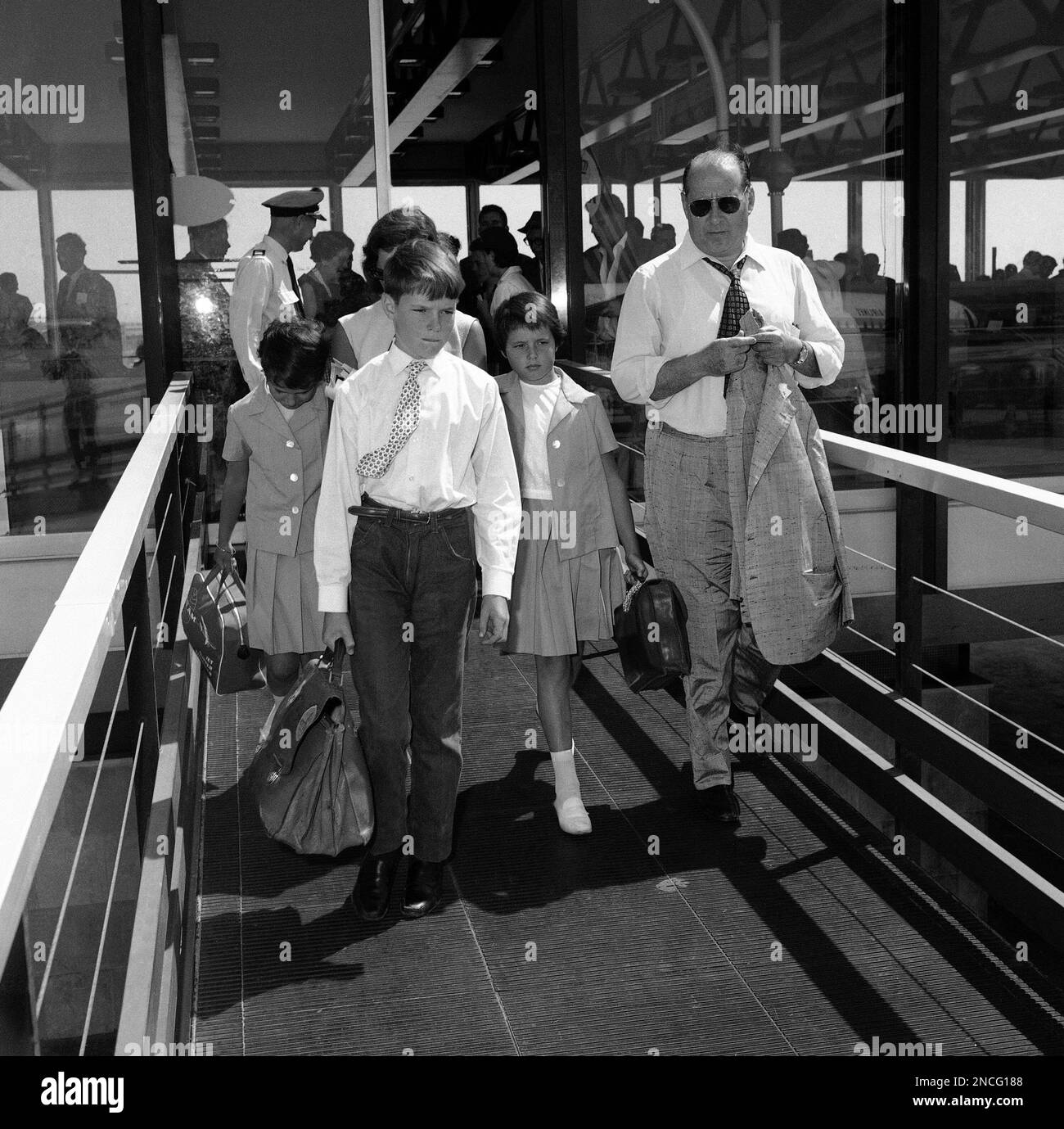 Italian movie director Roberto Rossellini, right, with his son ...