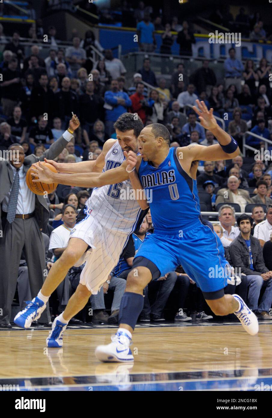 Orlando Magic forward Hedo Turkoglu, left, of Turkey, is fouled by ...