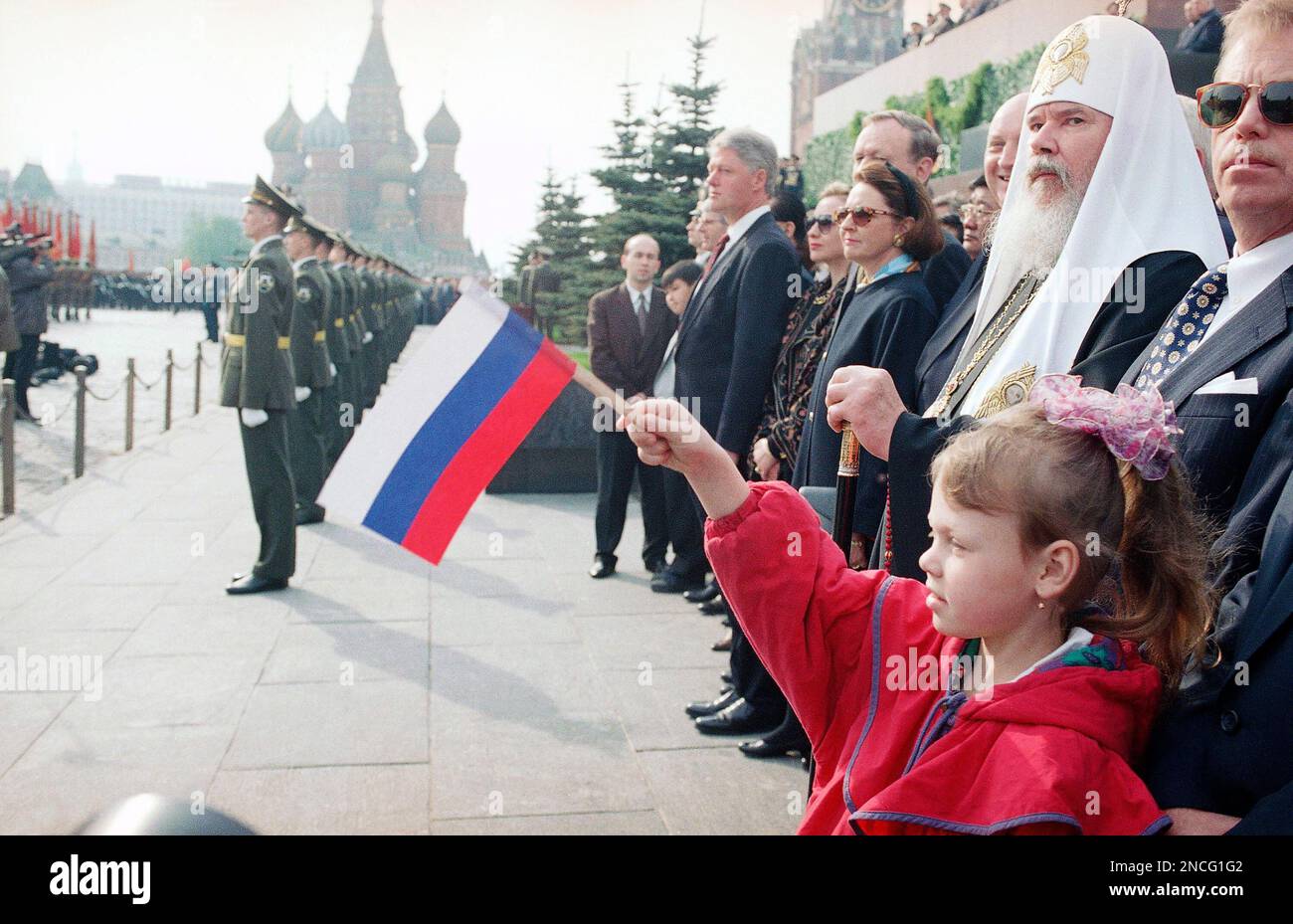 Little eight-year-old Dasha Sukhanova, of Moscow, waves the Russian ...
