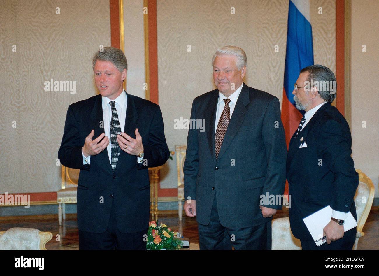 U.S. President Bill Clinton gestures after coming out of meetings with ...