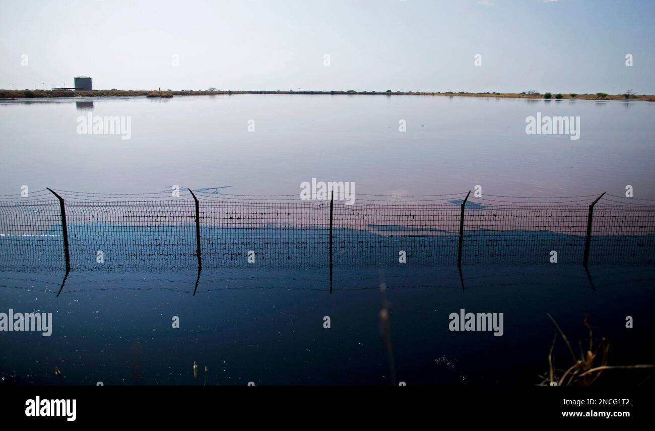 In this photo of Wednesday Nov. 17, 2010 waste-water pools outside the ...