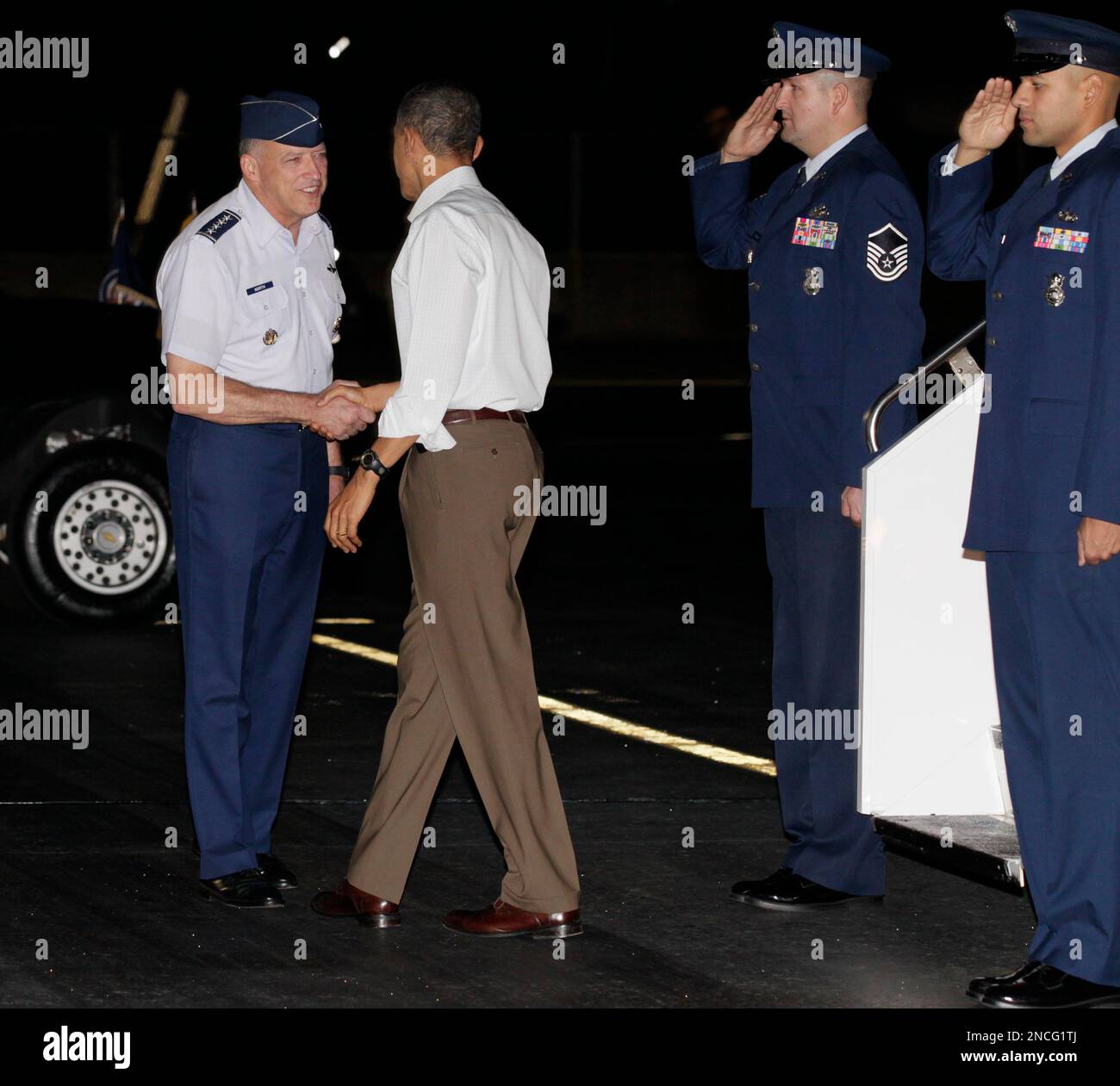 President Barack Obama, second from left, is greeted by Gen. Gary L ...