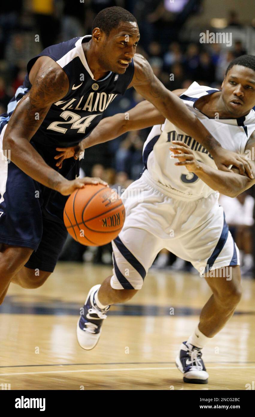Villanova's Corey Stokes (24) dribbles against Monmouth's Will Campbell ...