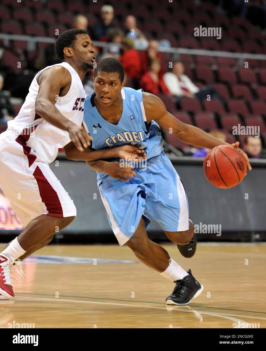 The Citadel's Cameron Wells, left, drives on South Carolina State's ...