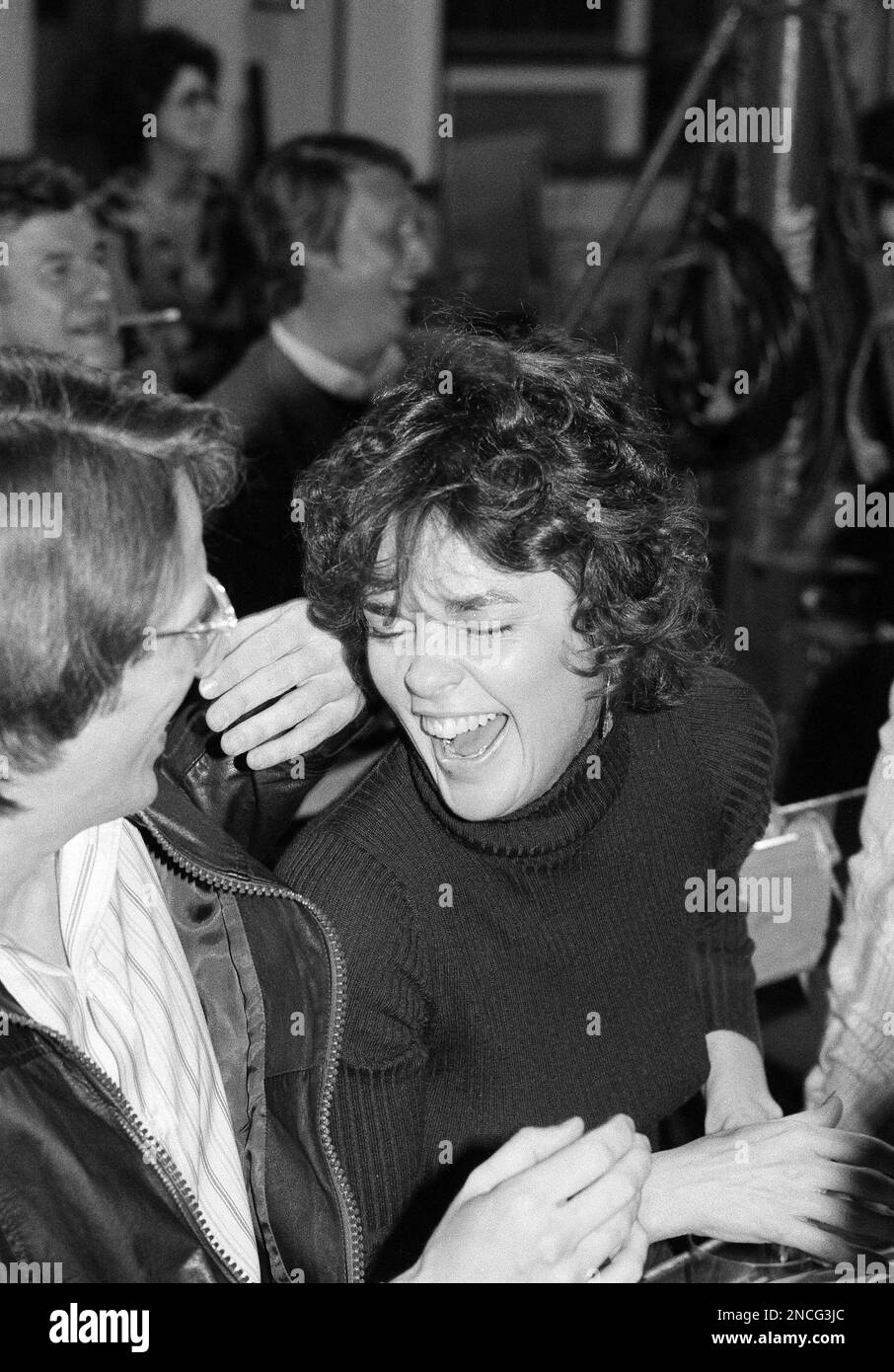 Actress Ali MacGraw laughs with actor Peter Weller after making the ...