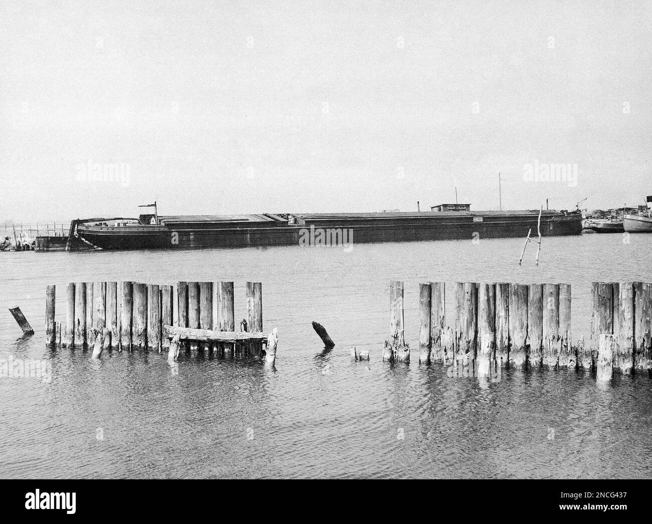 At the end of April, four barges filled with inmates of a concentration ...