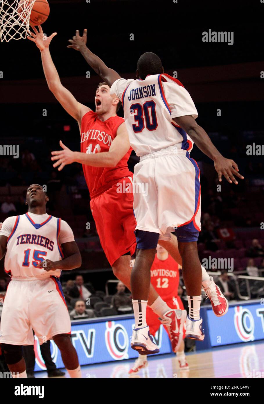 Davidson forward Clint Mann (40) goes up for a layup as St. Francis, N ...