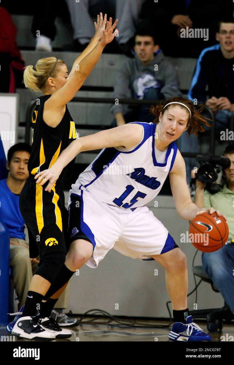 Drake forward Rachael Hackbarth, right, looks to drive around Iowa ...