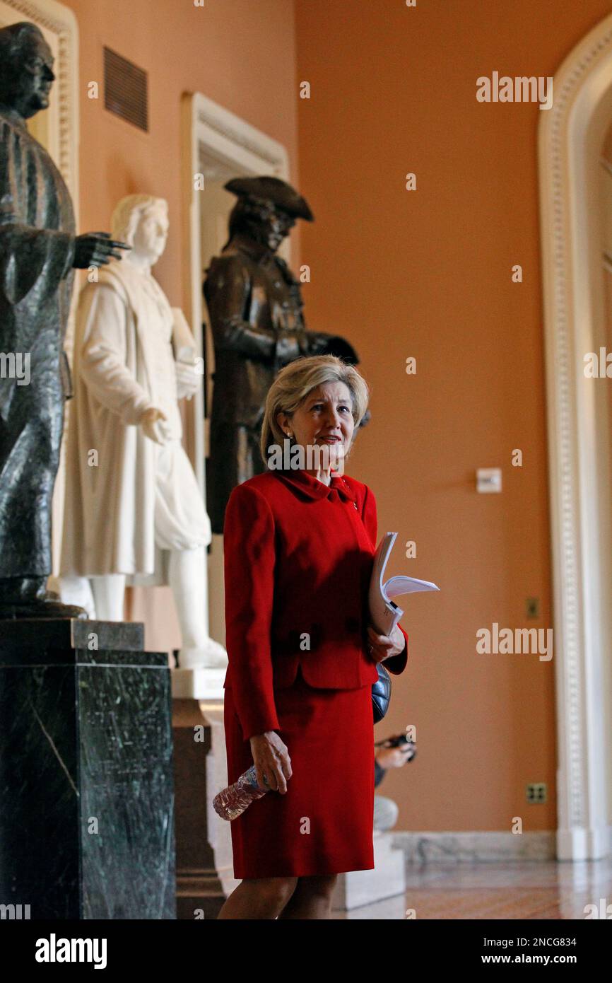Sen. Kay Bailey Hutchison, R-Texas, walks before an unusual closed ...