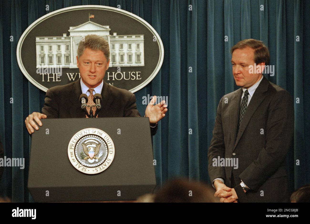 U.S. President Bill Clinton gestures in the White House briefing room ...