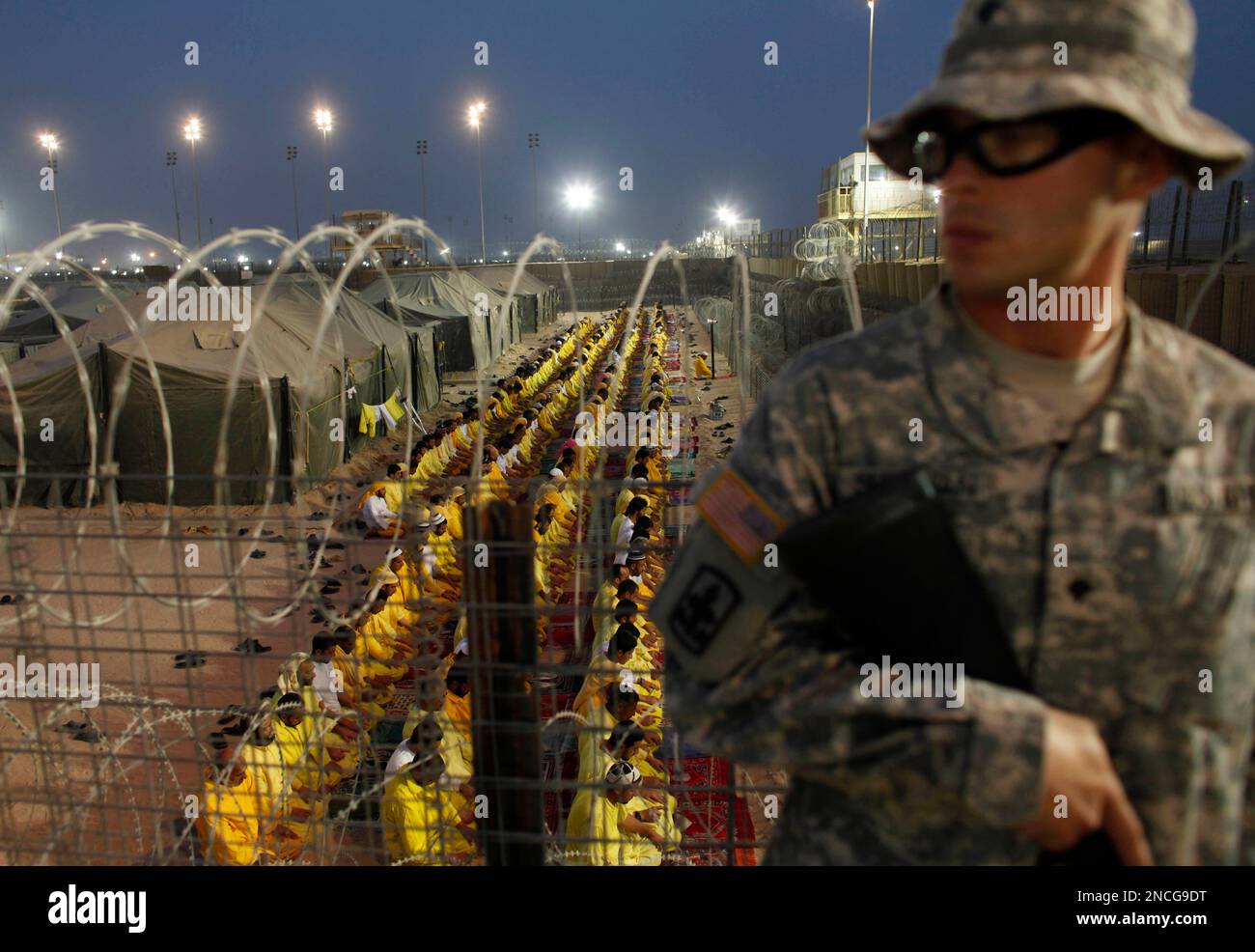 FILE - In this March 16, 2009 file photo, a U.S. soldier stands guard ...