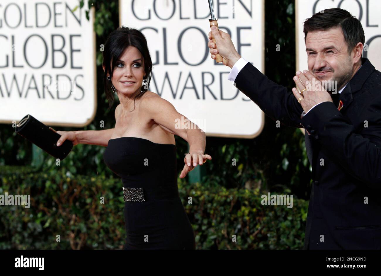 FILE - In this Jan. 17, 2010 file photo, actress Courteney Cox, left ...