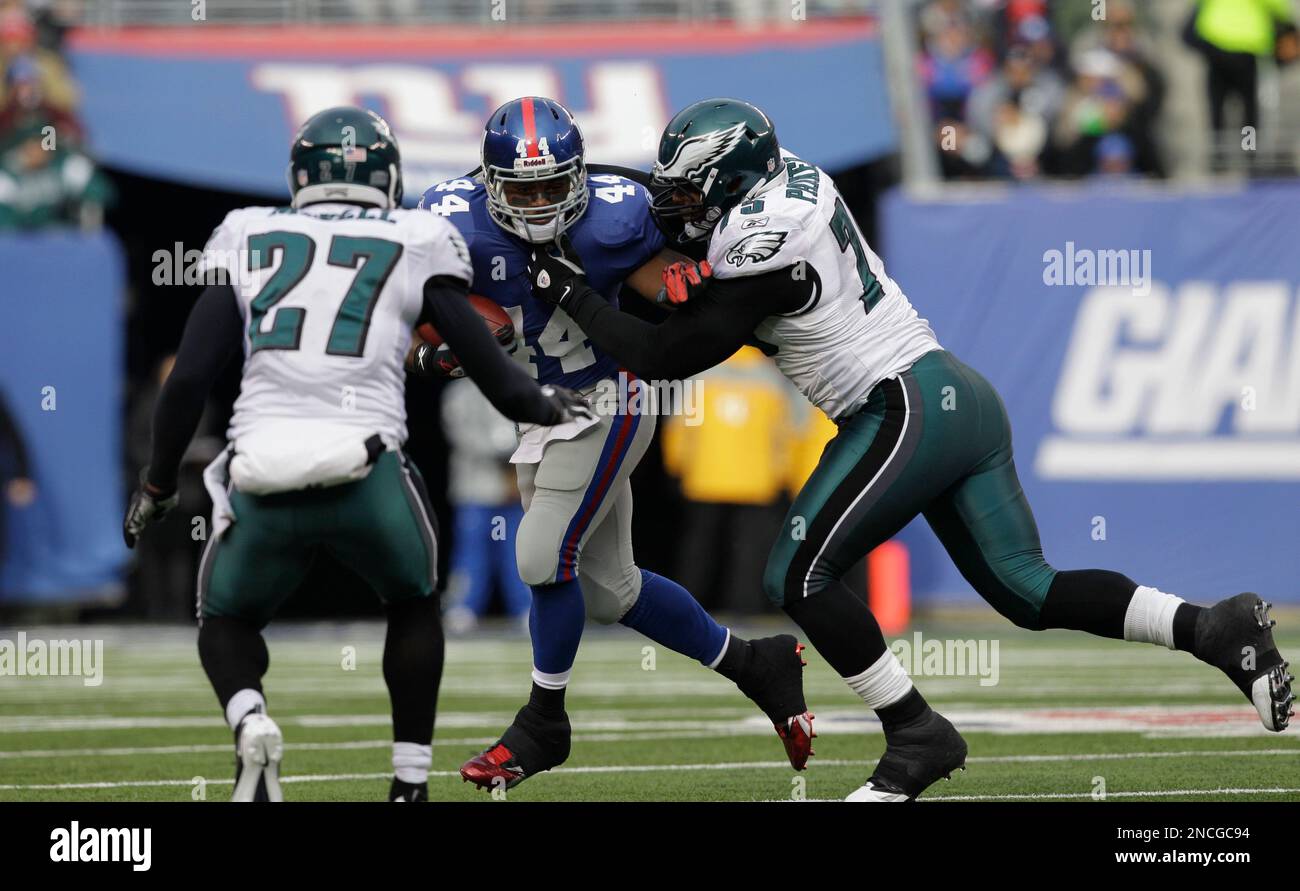 Philadelphia Eagles' Quintin Mikell (27) and Juqua Parker (75) tackle ...