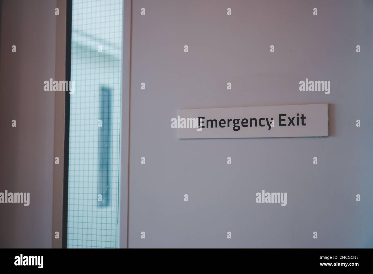 Emergency exit door. Building meergency exit Stock Photo - Alamy