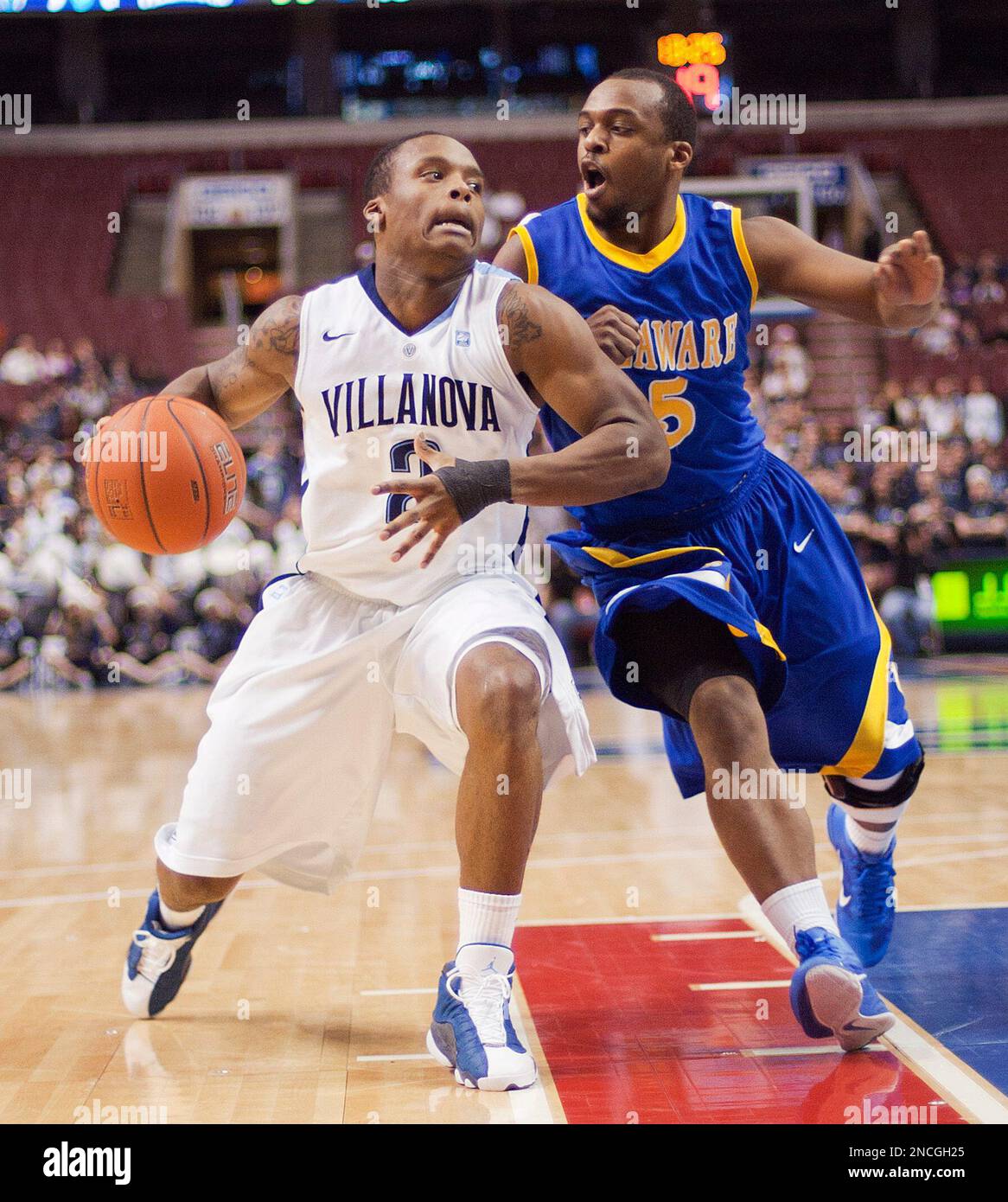 Villanova's, Maalik Wayns, left, drives as Delaware's Brian Johnson ...
