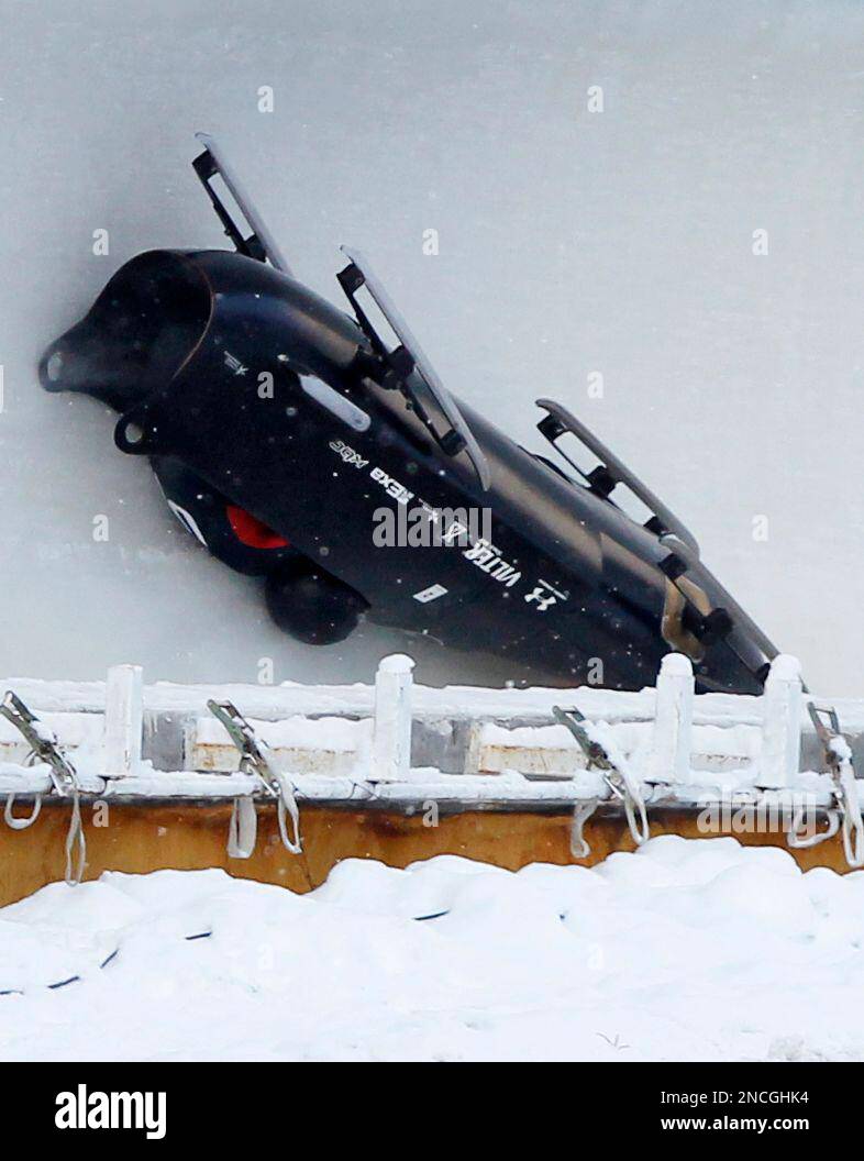 USA's Shauna Rohbock and teammate Valerie Fleming go through a turn ...