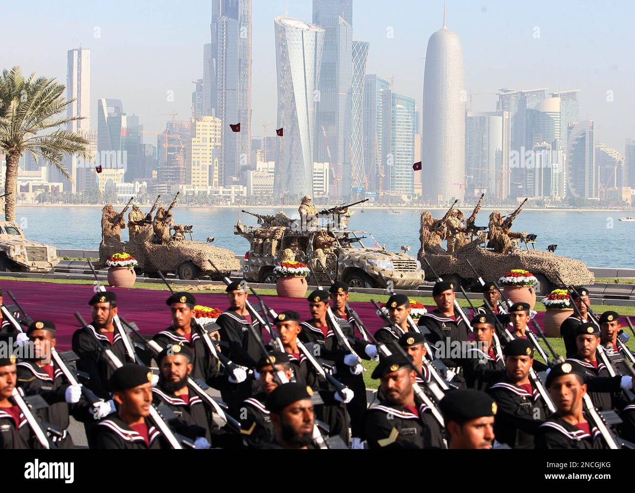 Qatari armed forces take part in a military parade during the Qatar ...