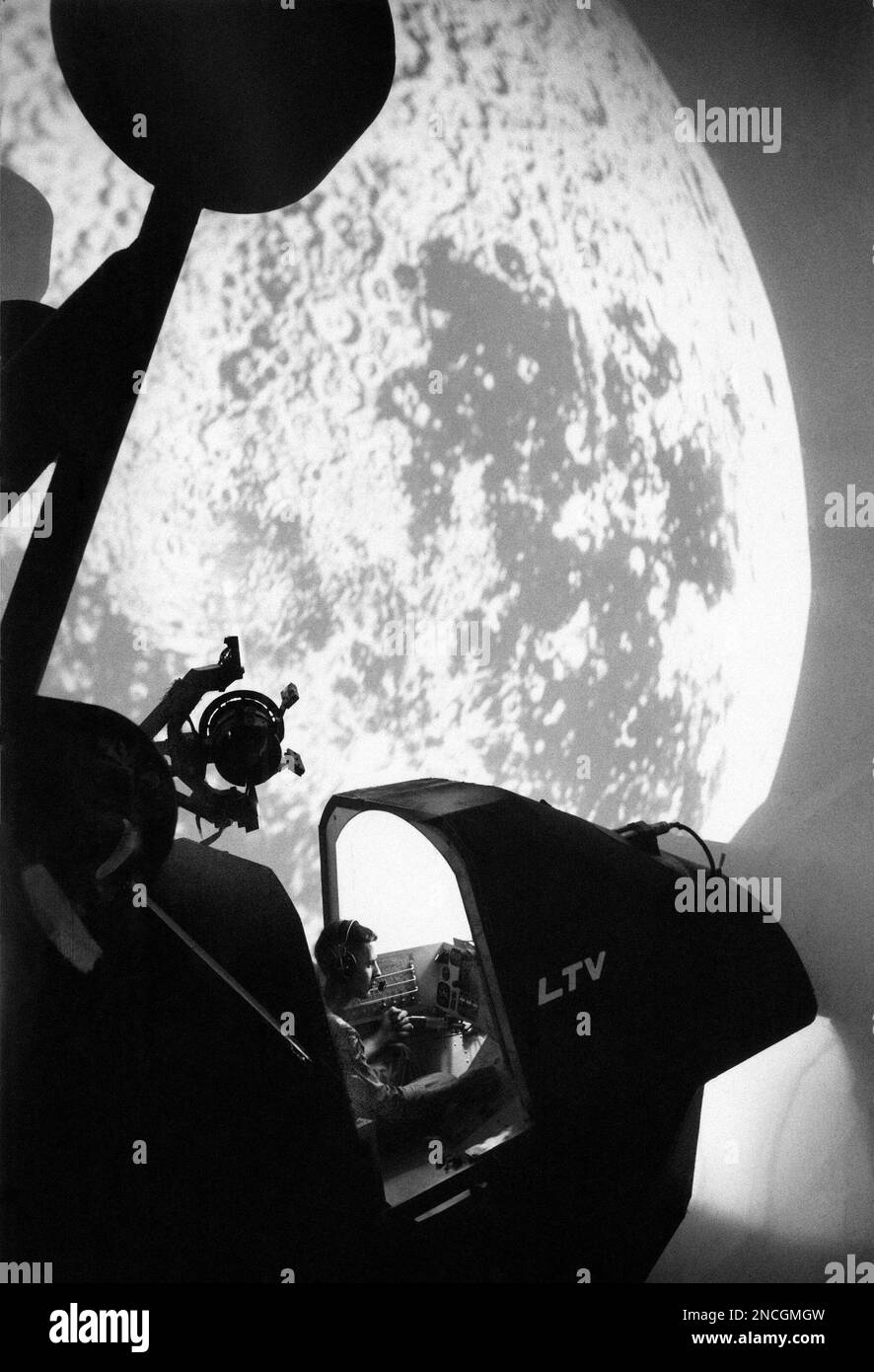 Capt. William A. Anders, U.S. astronaut, operates the controls of a ...