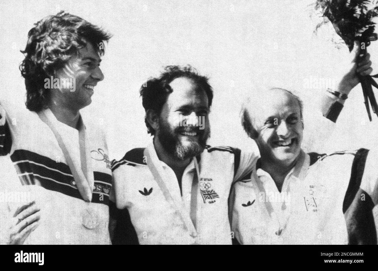 Malcolm Cooper, center, of Great Britain, is flanked by Daniel Nipkow ...