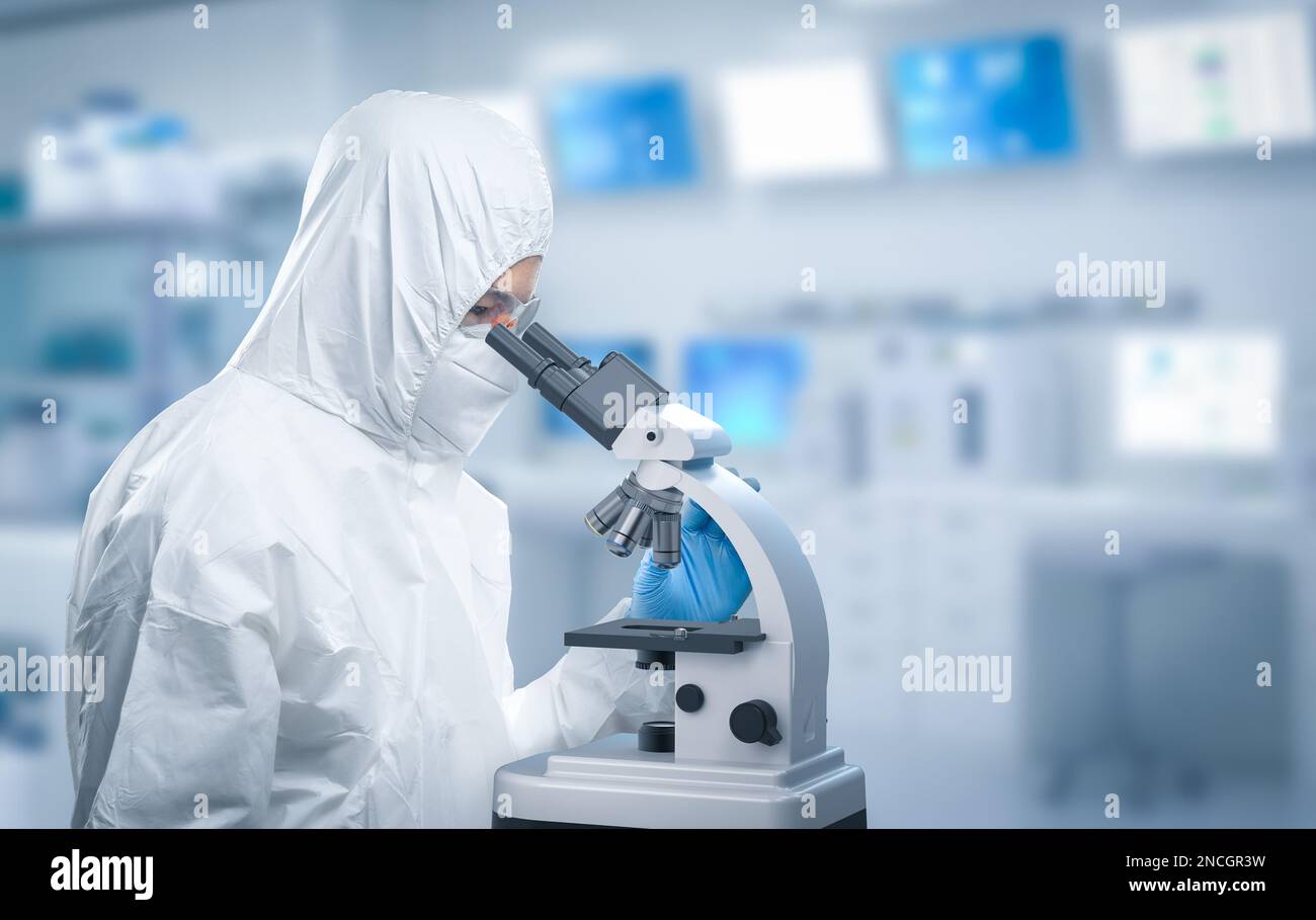 Worker wears medical protective suit or white coverall suit with mask ...
