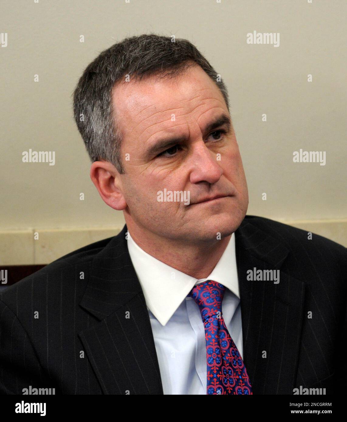 Career civil servant Frank Ruggiero listens as President Obama speaks ...