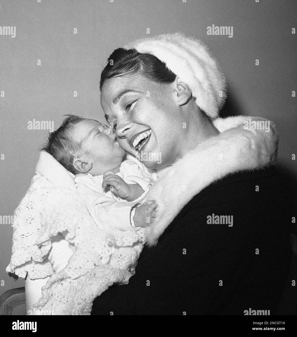Mrs. Kathy Crosby, wife of singer Bing Crosby, appears to be getting a ...