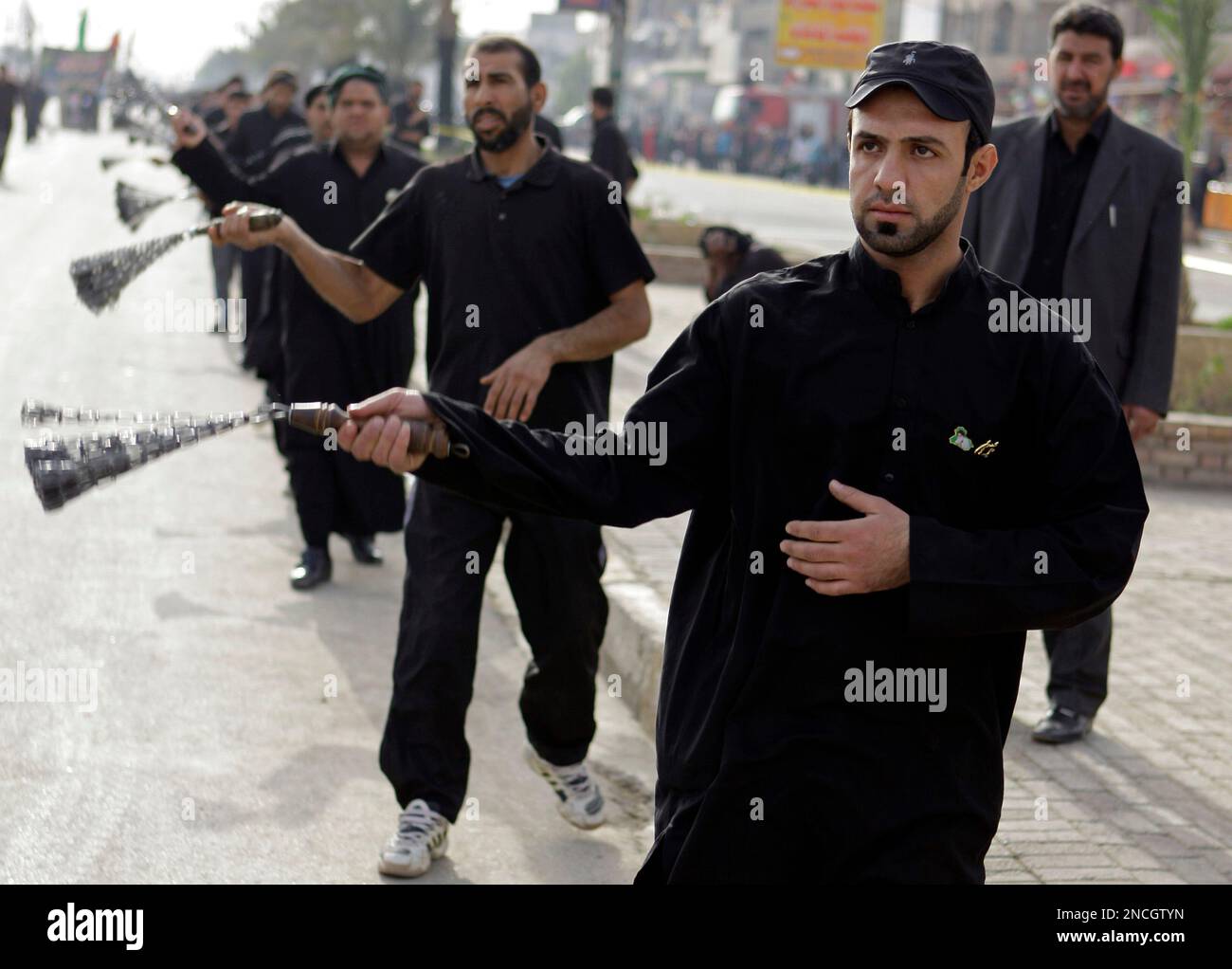 Iraqi Shiite beat themselves with chains during Muharram, a ...