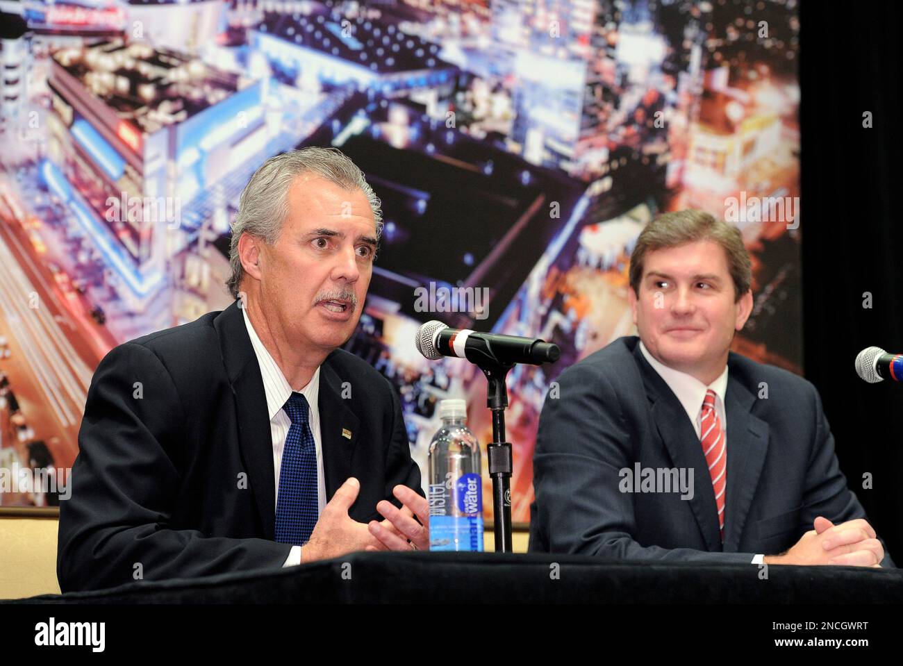Terry Miller, left, president and CEO of HNTB Architecture speaks ...