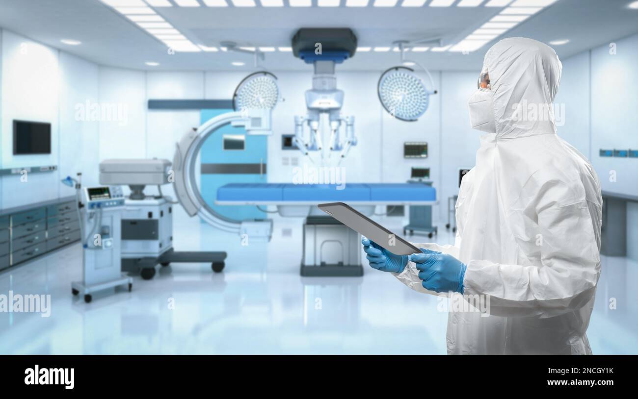 Doctor wears white protective suit hi-res stock photography and images ...