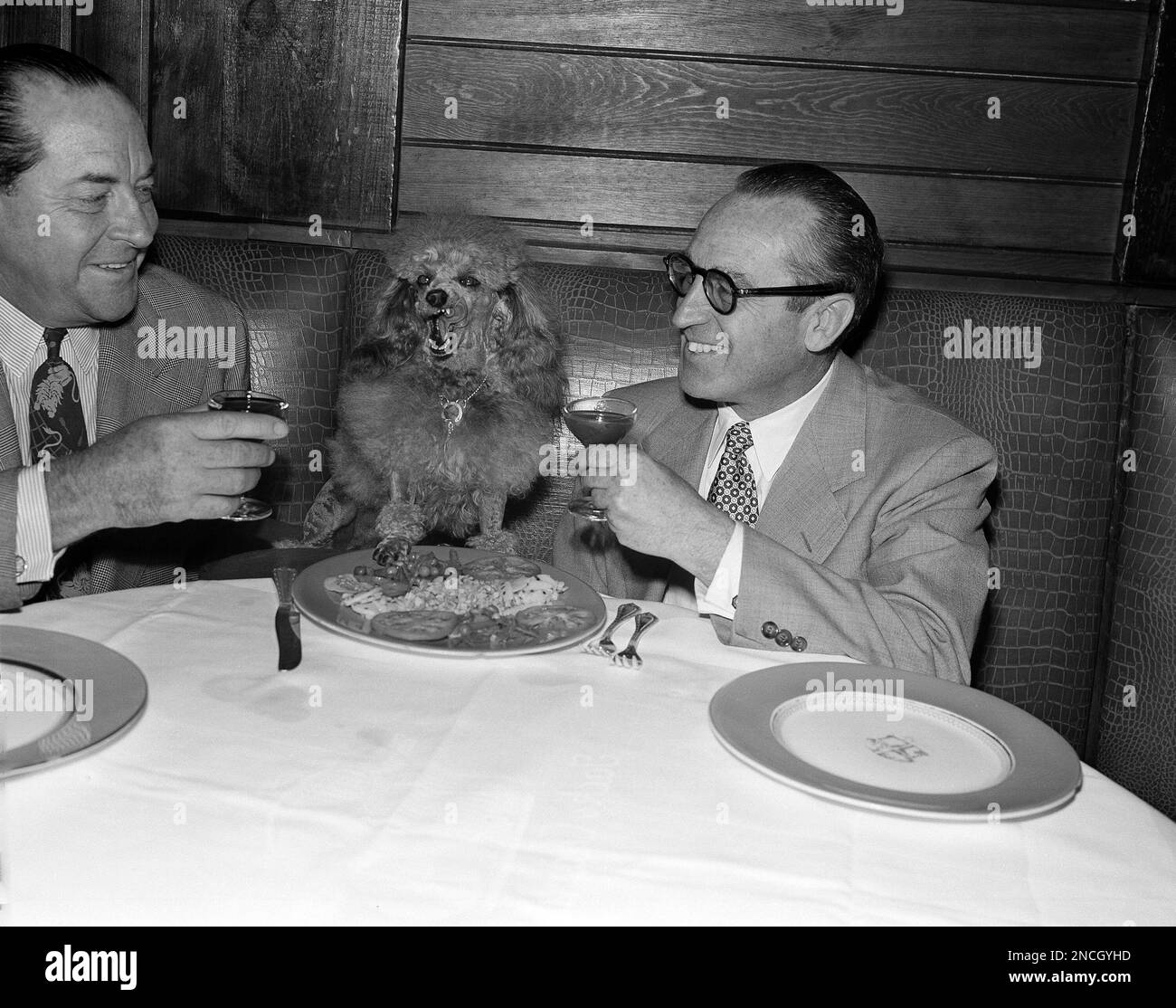 Francis T. (Frank) Hunter, a tennis great of yesteryear, left, and ...