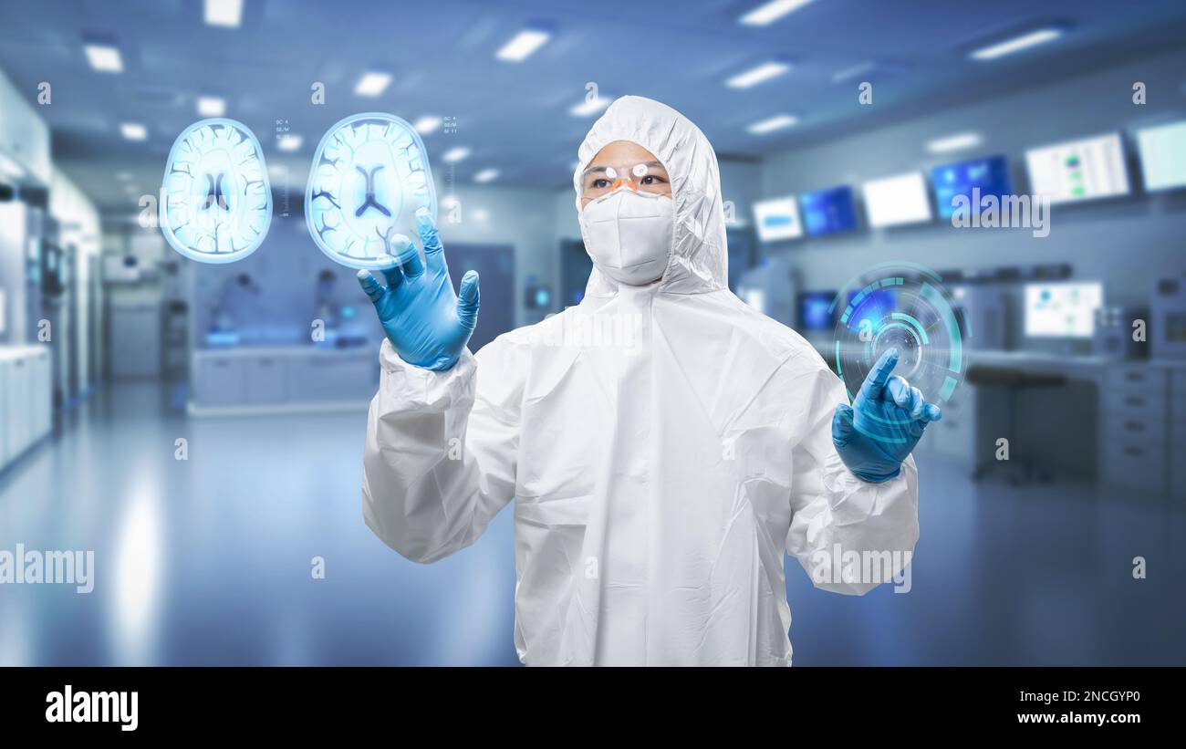 Doctor wears medical protective suit or white coverall suit with x-ray ...