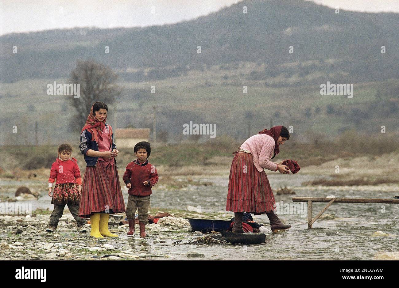 Gypsies from the Transylvania village of Porumbacu de Jos, Romania wash ...