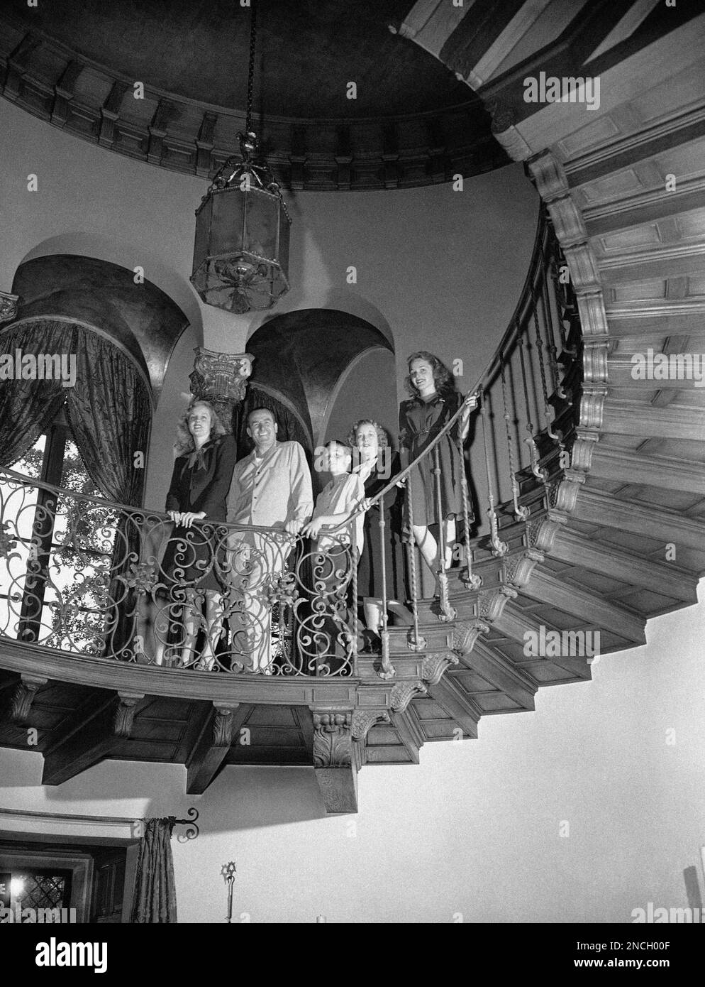 The entire Lloyd family is shown on the spiral staircase of their ...