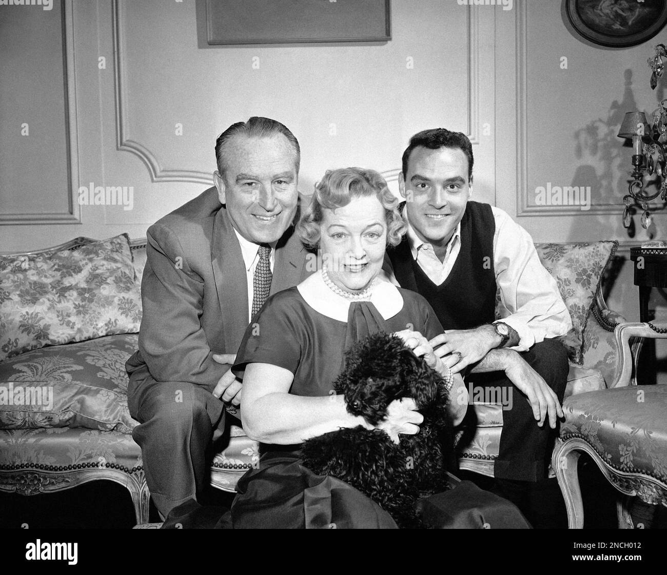 Harold and Mildred Lloyd, with their son, Harold Jr., and the family poodle - Pierre - at the ...