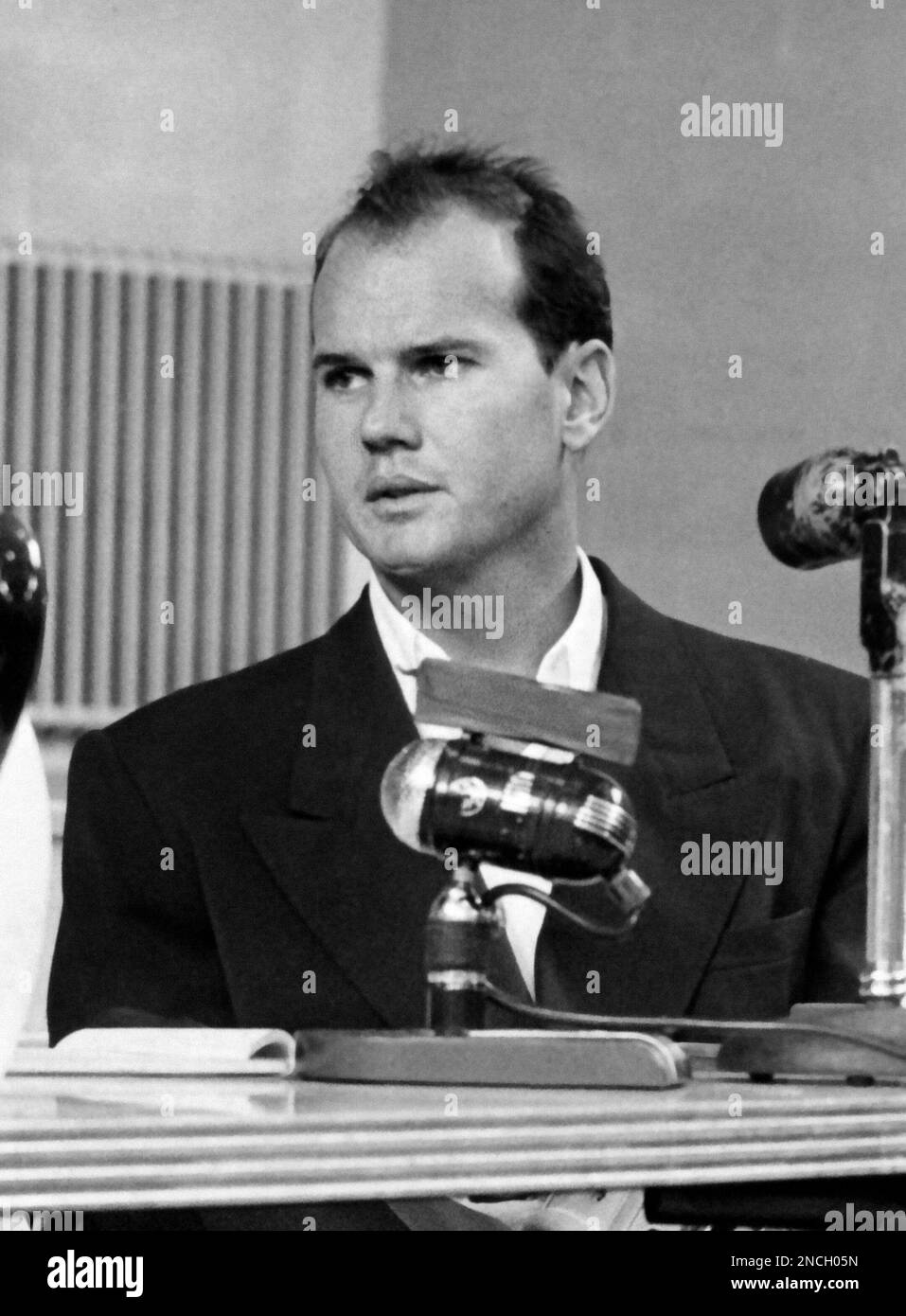 Testifying at an inquest into the slaying of his wife Marilyn, Dr ...