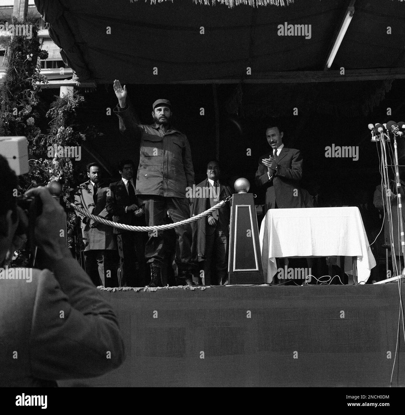 Cuban Prime Minister Fidel Castro waved to the crowd after his speech ...