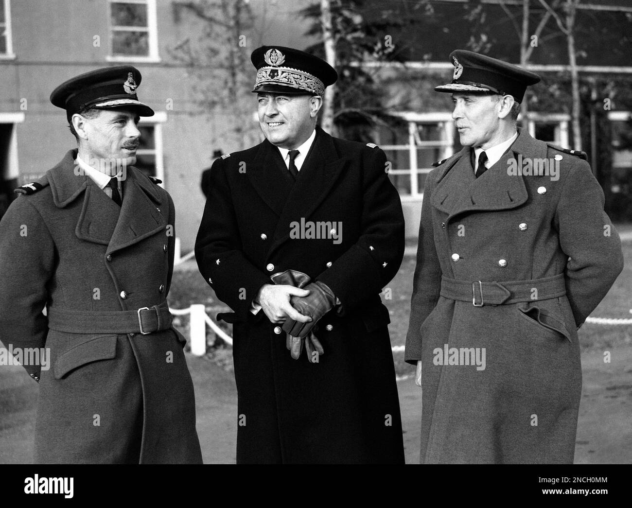 French Rear Admiral Henri Nomy, centre, after he had arrived at ...