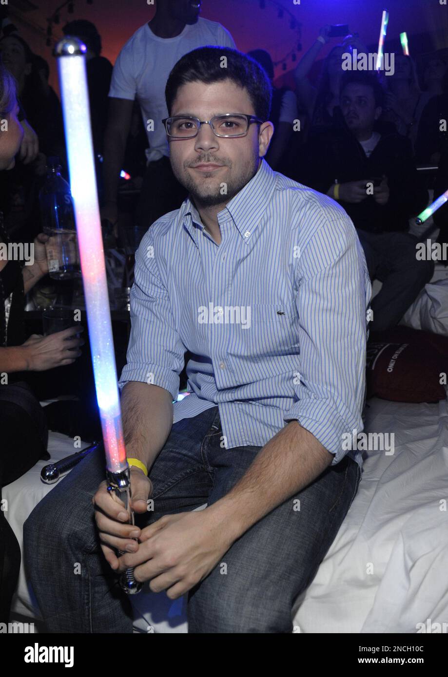 Actor Jerry Ferrara poses with a lightsaber at the Blu-ray and DVD ...
