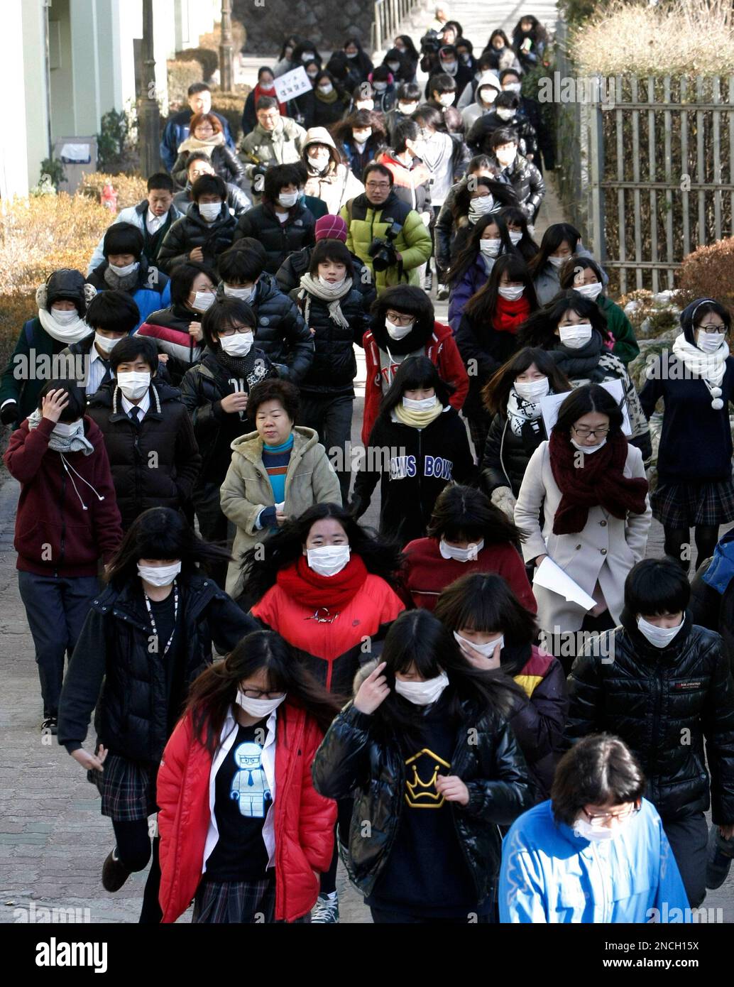 South Korean students rush to a shelter during a civil defense drill ...