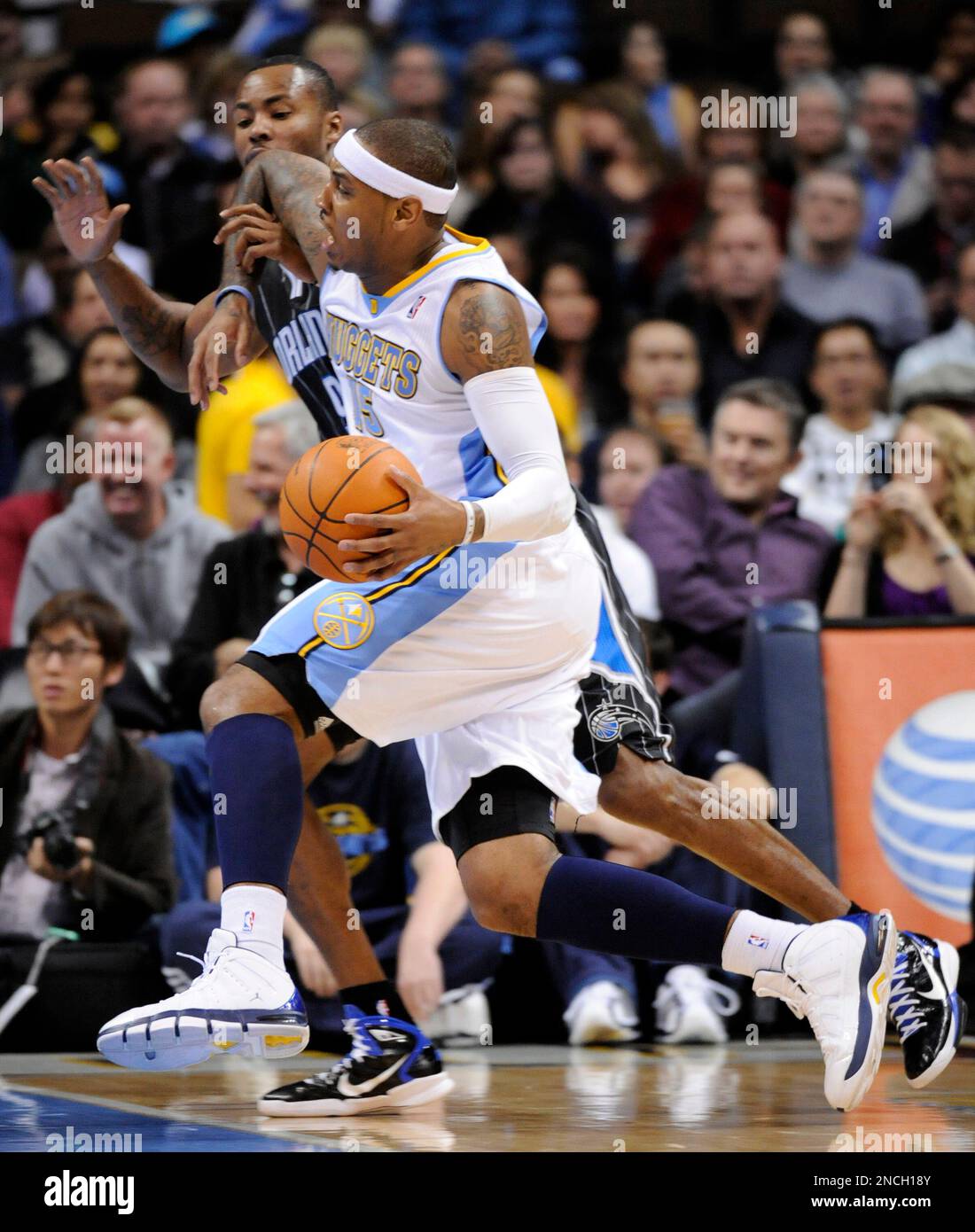 Denver Nuggets forward Carmelo Anthony (15) drives past Orlando Magic ...