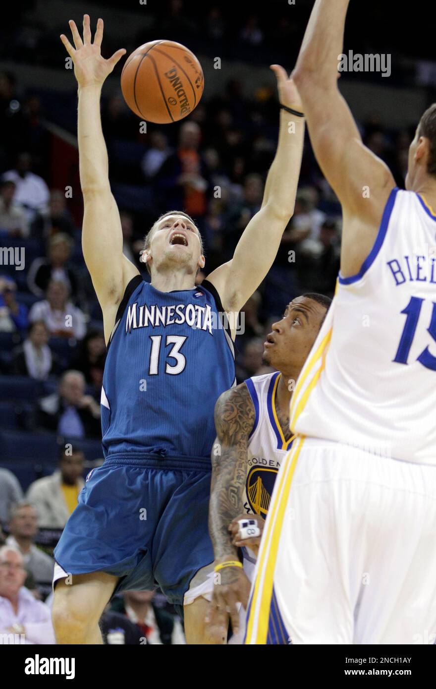 Minnesota Timberwolves' Luke Ridnour (13) loses control of the ball as ...