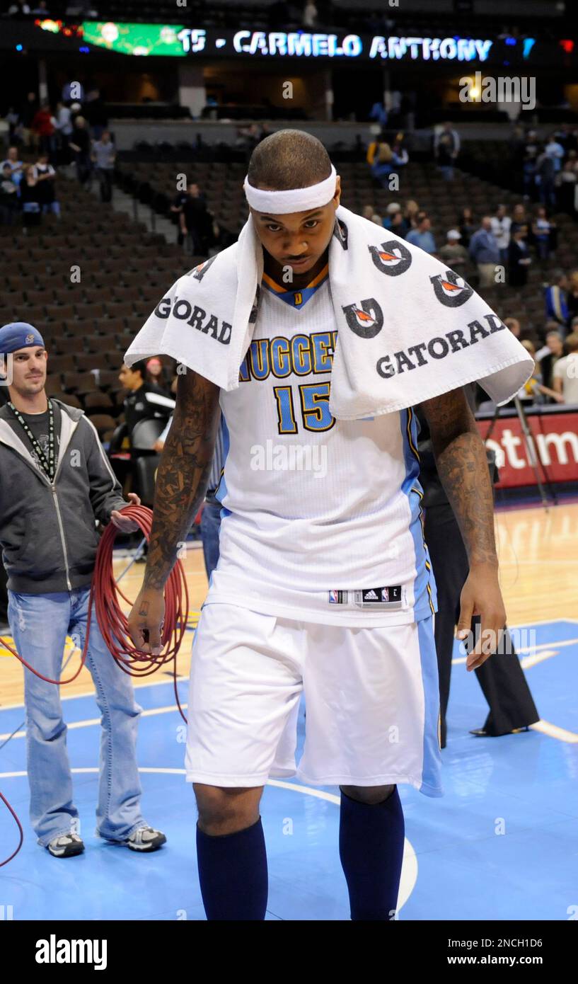 Denver Nuggets forward Carmelo Anthony leaves the court following an ...