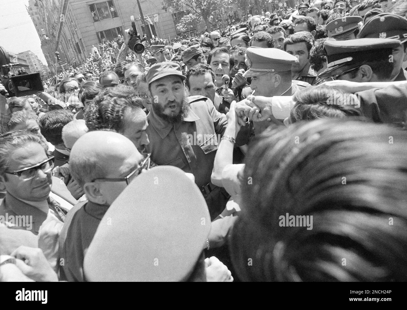 Cuba’s Prime Minister Fidel Castro shakes hands with admirers when he ...
