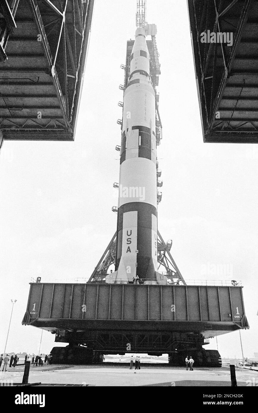 The Apollo-Saturn 5 facilities vehicle inches from the assembly ...