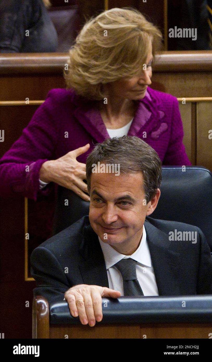 Spain's Finance Minister Elena Salgado, top passes by Spain's Prime ...