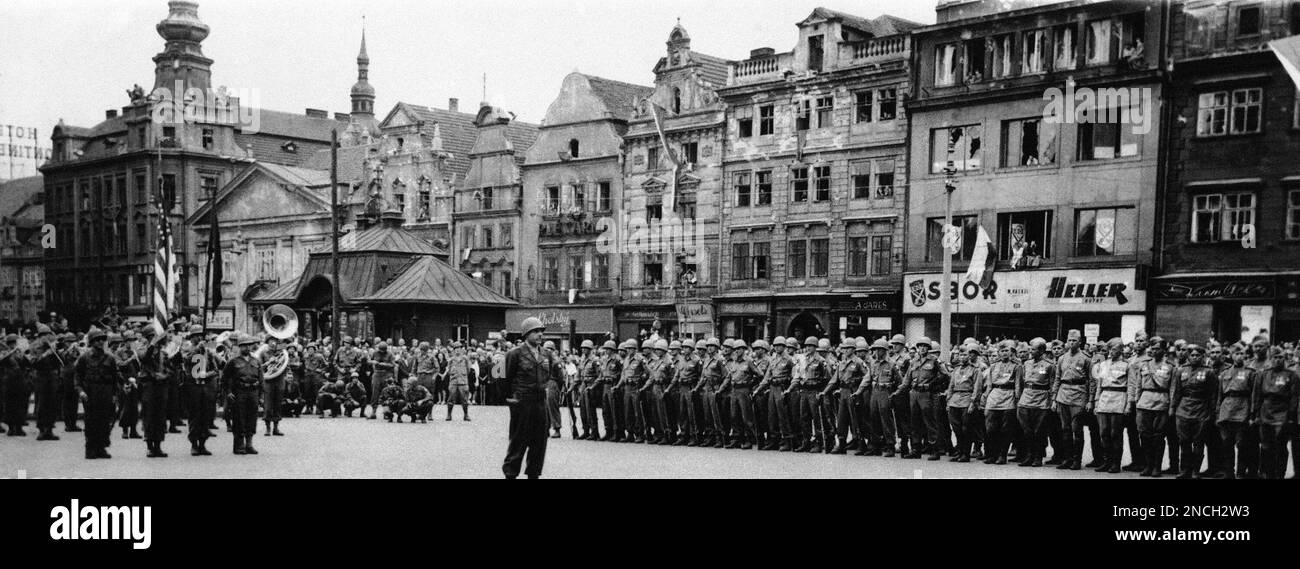 American forces of the third U.S., army line up side by side with men ...