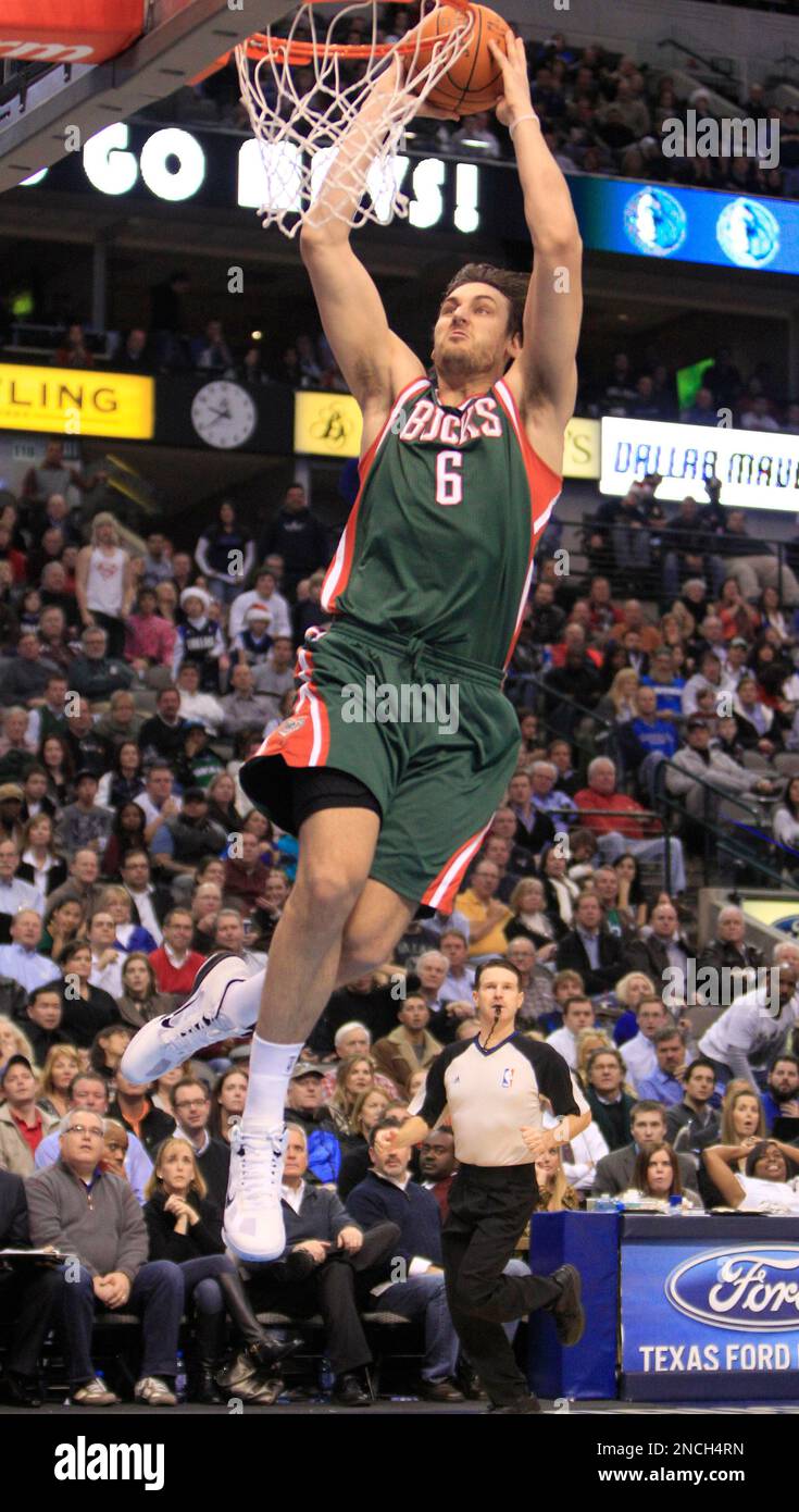 Milwaukee Bucks center Andrew Bogut (6) of Australia dunks after stealing the ball during the ...
