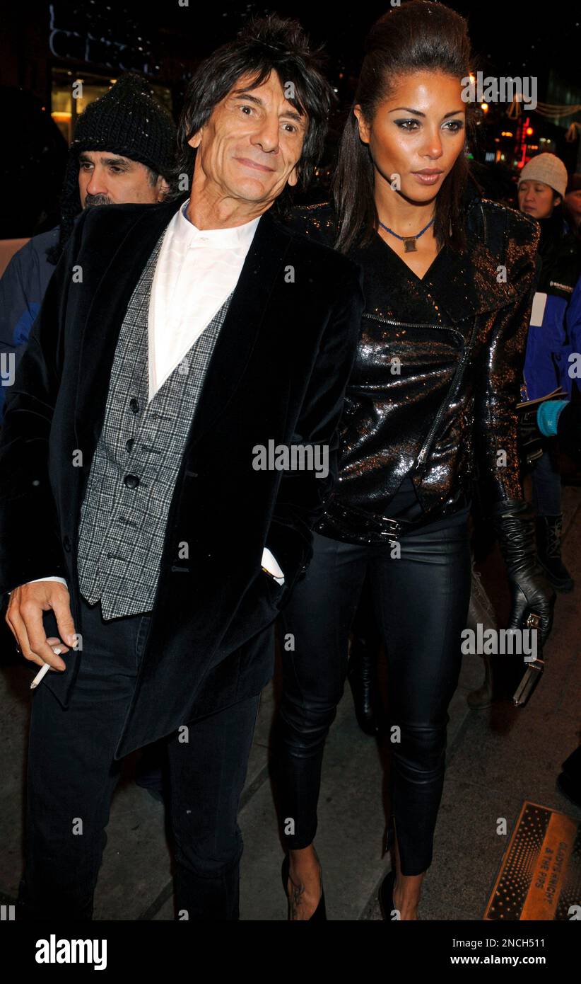 Rolling Stones' guitarist Ron Wood, left, and his girlfriend, Ana ...