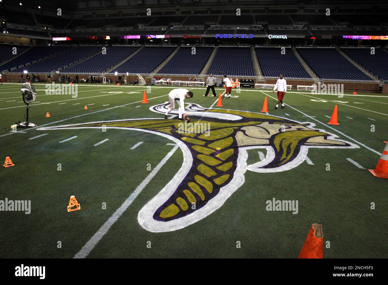 The Minnesota Vikings logo is shown at midfield before the start of an ...